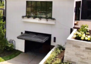 Tilt-up Luxury Garage Doors | Hydraulic Swing Out System