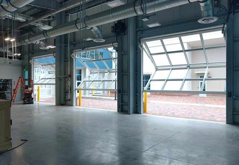Hydraulic bifold doors for college campus | Premier Door Co.
